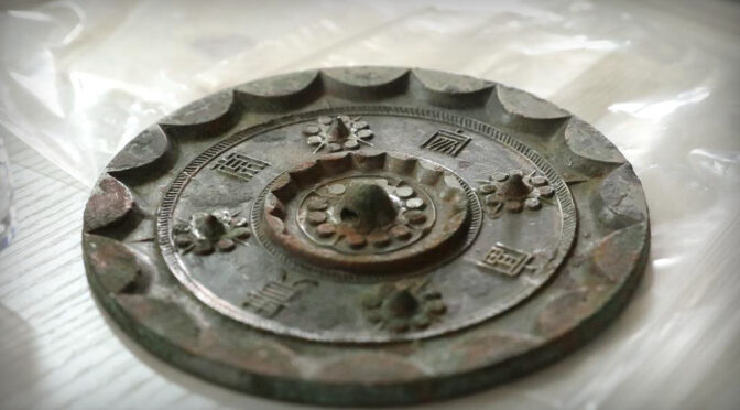 Over 2,000-year-old bronze mirrors unearthed at a cemetery in NW China