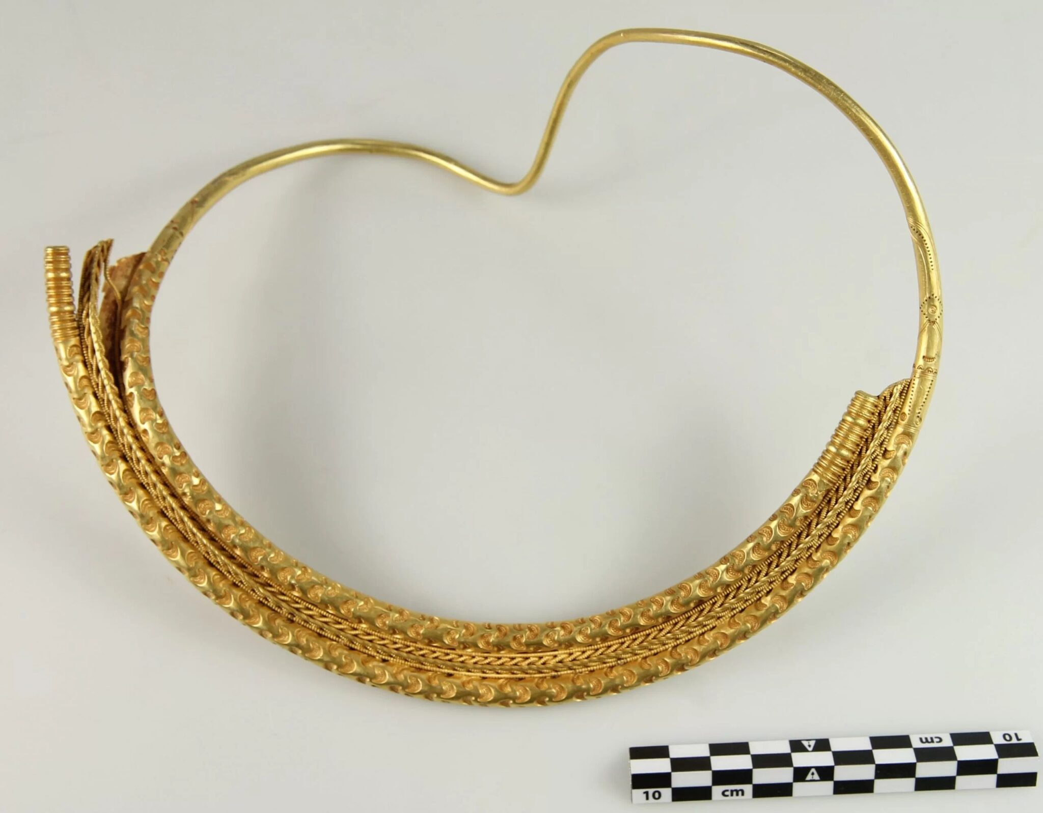 Ancient golden neck ring found in Denmark | ARCHAEOLOGY WORLD