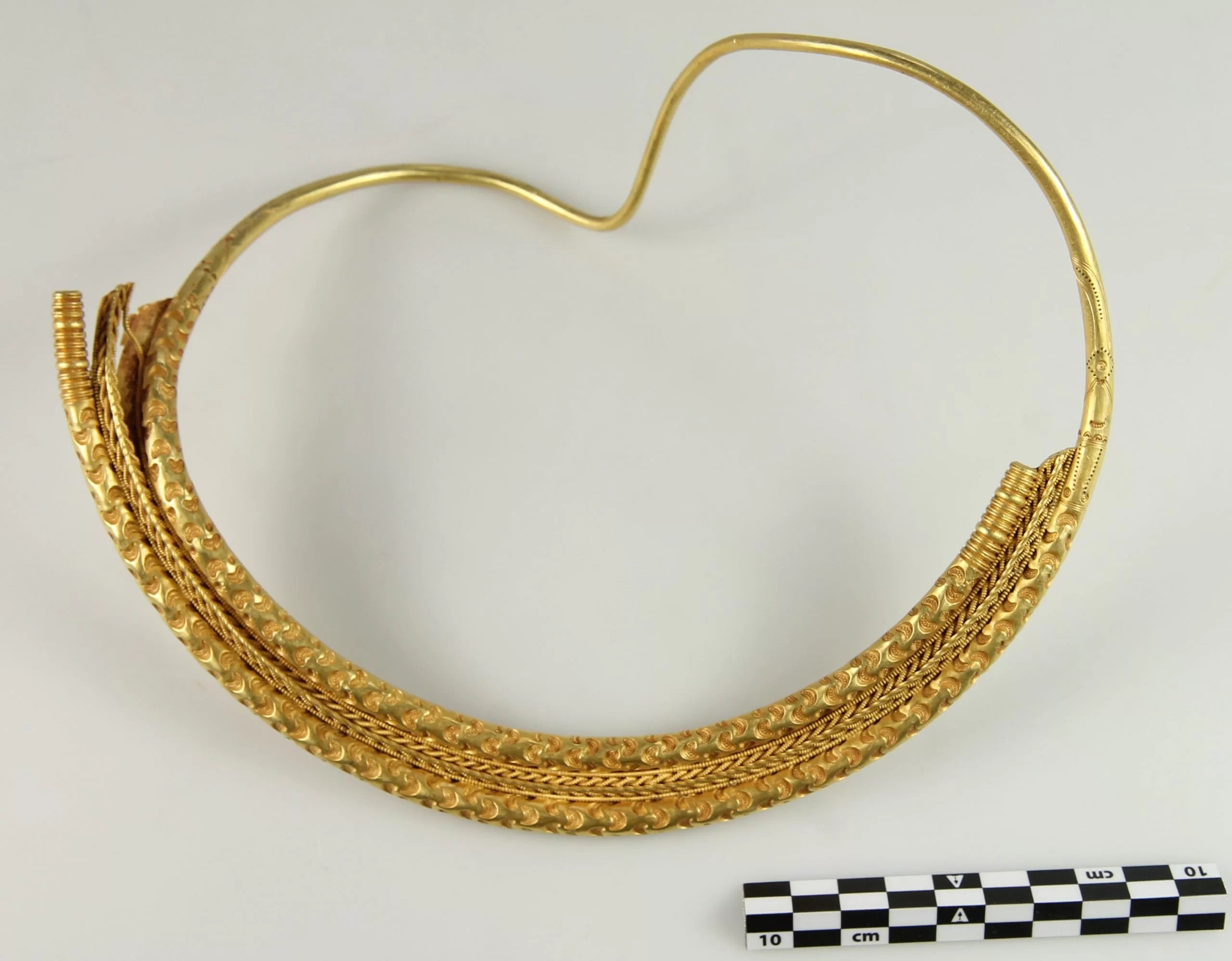 Ancient golden neck ring found in Denmark | ARCHAEOLOGY WORLD