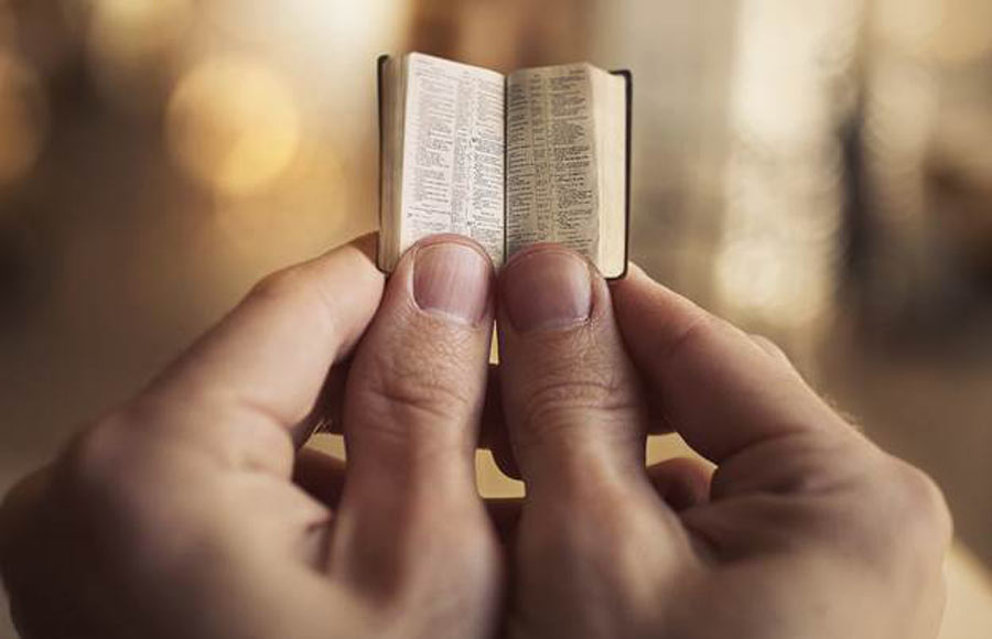 Miniature Bible the Size of a Coin Found in UK Library Storage ...